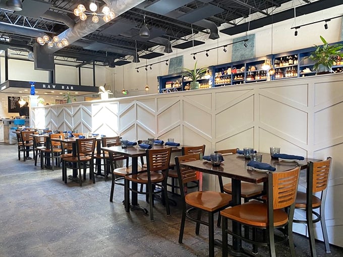 Clean lines, warm woods, and that raw bar sign promising oceanic treasures &ndash; this dining room says "we're serious about seafood" without shouting it.