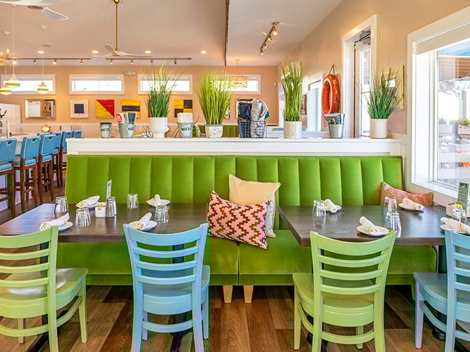 Those vibrant lime green banquettes aren't just Instagram-worthy&mdash;they're the perfect backdrop for the seafood feast you're about to demolish.