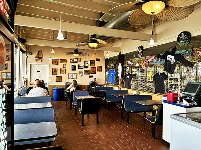 Inside Neptune's Net, nautical nostalgia meets no-nonsense dining. Those paddle-shaped ceiling fans aren't just for show&mdash;they're keeping your seafood cool.