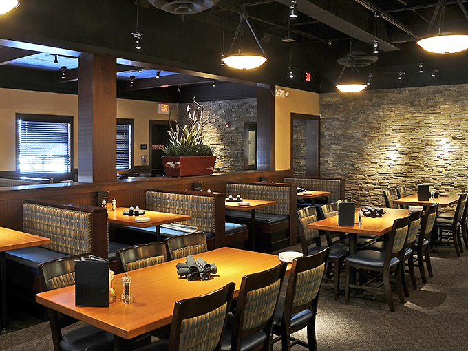 Stone walls and warm wood create an atmosphere that's both rustic and refined&mdash;the perfect backdrop for seafood that deserves your full attention. 