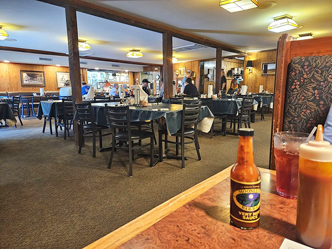 Inside Moonlite's wood-paneled dining room, generations of Kentuckians have gathered around these tables for what might be the Commonwealth's most sacred food ritual.