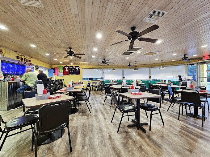 Inside, wooden-paneled ceilings and turquoise booths create that perfect coastal diner vibe &ndash; comfortable enough to linger, tempting enough to return tomorrow.