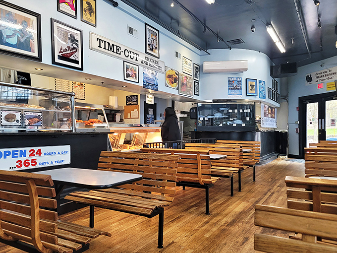 Simple wooden benches and no-frills tables send a clear message: the food is the star of this decades-old show.