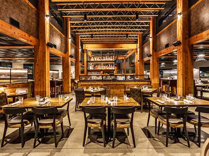 Architecture that makes you pause mid-conversation. Those soaring wooden beams create the perfect marriage of rustic charm and modern elegance&mdash;like a cathedral dedicated to good eating.