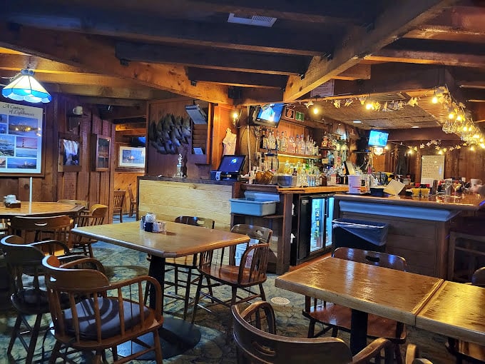 Step inside and you're transported to a cozy maritime haven &ndash; warm wood paneling, nautical decor, and twinkling lights create the perfect seafood sanctuary.