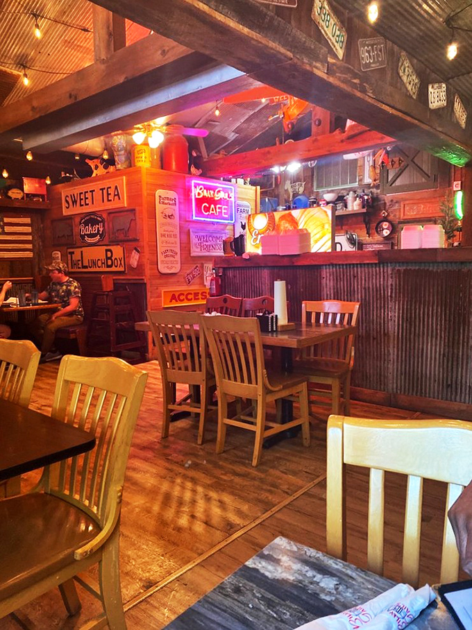 Inside, every inch tells a story &ndash; vintage signs, wooden beams, and a "SWEET TEA" proclamation that feels like a promise kept.