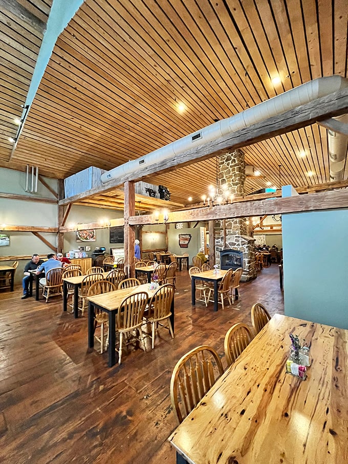 Wooden beams that could tell stories stretch across the ceiling, while natural light dances across tables where memories are made one bite at a time.