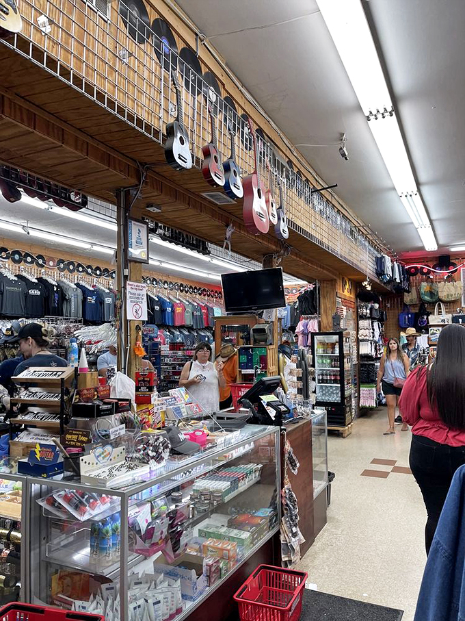 Step inside and time surrenders to wonder. Miniature guitars hang overhead like musical stalactites while treasures stretch as far as the eye can see.