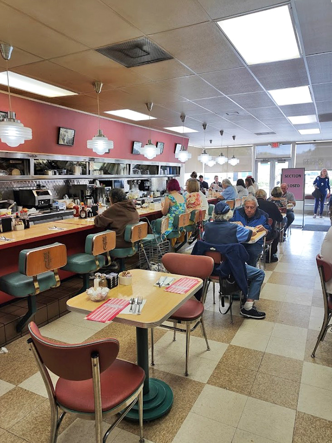 Classic diner counter seating where strangers become friends and calories don't count. The vintage charm here isn't manufactured&mdash;it's earned through decades of serving comfort.
