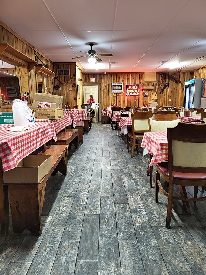 Classic red-and-white checkered tablecloths and wood-paneled walls create the perfect backdrop for barbecue bliss. This isn't d&eacute;cor&mdash;it's a promise of authenticity.