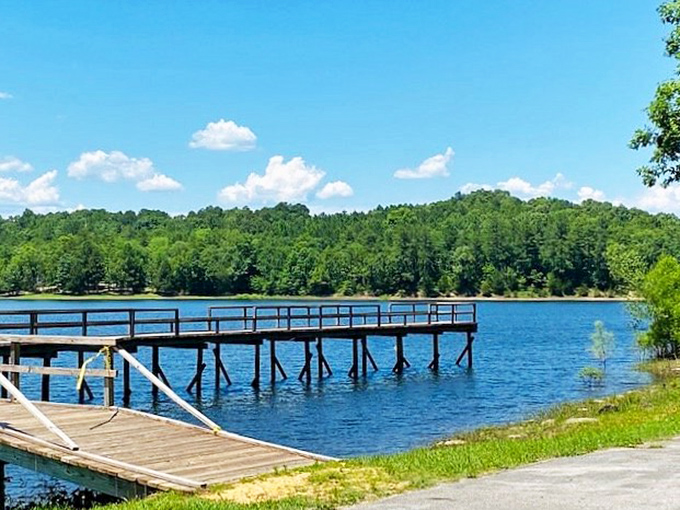 Hikers navigate Tishomingo's rocky terrain, where every step feels like you've wandered into the Appalachians' southern outpost rather than Mississippi flatlands.