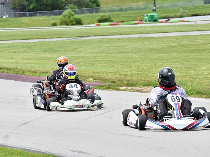 When the helmets go on, age differences disappear. These racers lean into turns with the perfect combination of precision and controlled abandon.