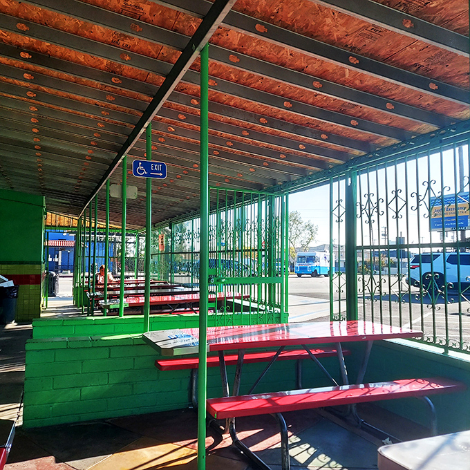 Red benches and wooden beams create a no-nonsense dining atmosphere where the only thing that matters is what's on your plate. Simplicity at its finest.