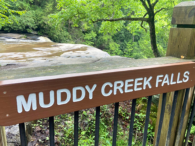The entrance sign promises adventure, but doesn't mention the symphony of rushing water that awaits just beyond those towering pines.
