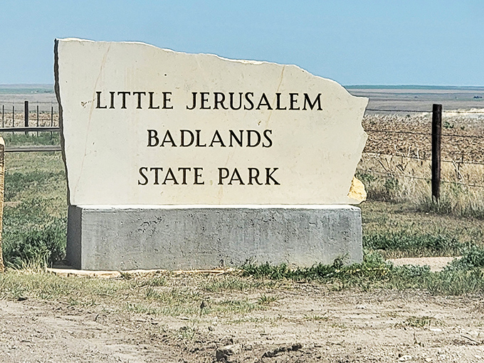 The understated entrance sign belies the otherworldly landscape beyond&mdash;like finding the doorway to Narnia in the back of a Kansas closet.