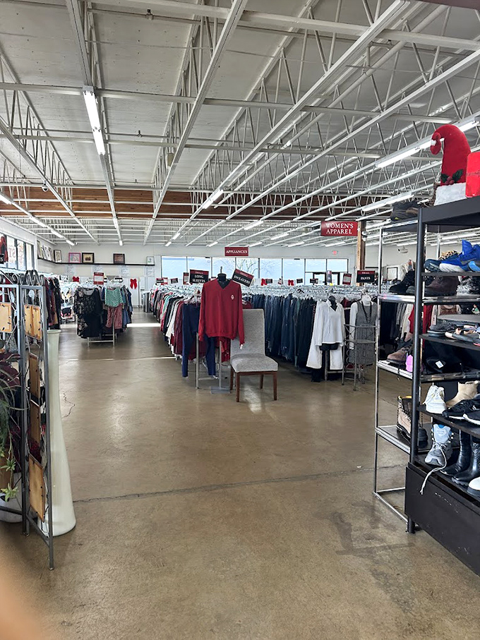 A sea of possibilities hangs in the women's clothing section. Each garment whispers tales of previous lives while patiently waiting for its next adventure. 