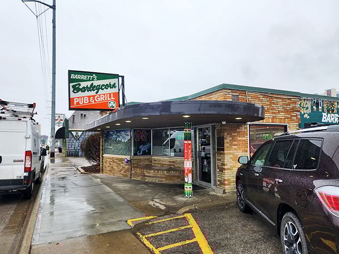 Barrett's Barleycorn's vintage sign promises a cold beer, but the real treasure lies in their sandwich menu &ndash; Nebraska's best-kept secret.