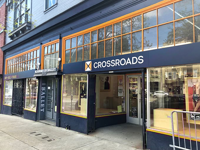 Crossroads Trading's eye-catching blue and orange exterior is like a peacock among pigeons in the thrift world.