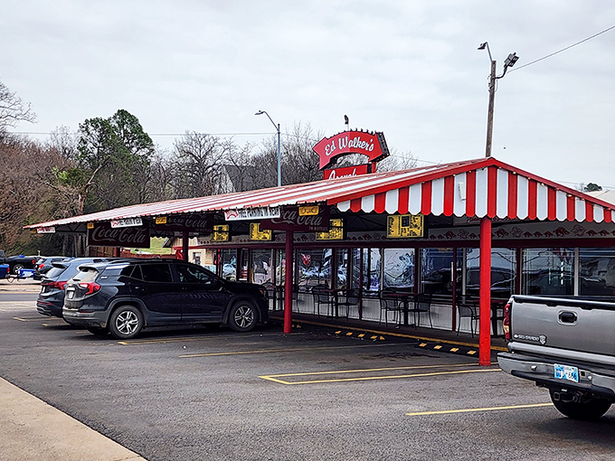 Ed Walker's red-and-white striped awning isn't just nostalgic—it's a time portal to the golden age of drive-ins.
