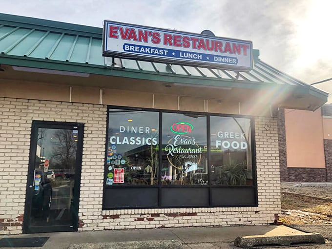 Evan's Restaurant storefront: Unassuming brick exterior, life-changing omelets inside. Like finding out your quiet neighbor is secretly a gourmet chef.