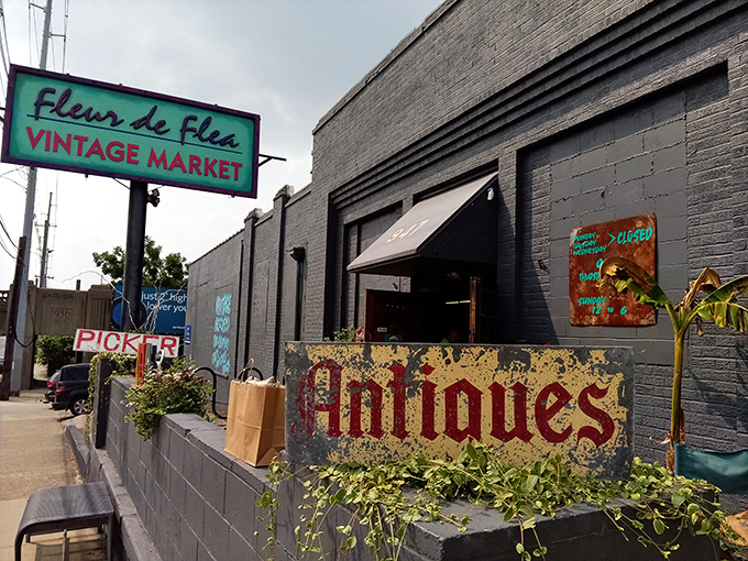 Fleur de Flea's industrial-chic facade isn't joking around &ndash; that vintage "Antiques" sign has probably witnessed more history than your grandfather's stories.