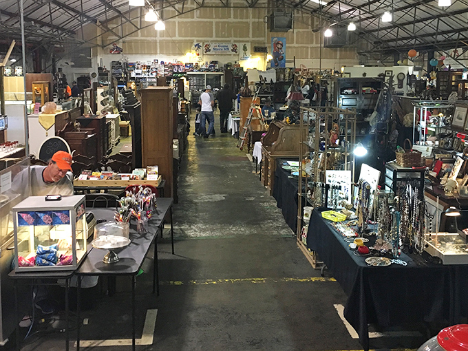 Long aisles of possibility! Every booth at Menge Flea Market holds someone's past treasure waiting to become your future conversation piece 
