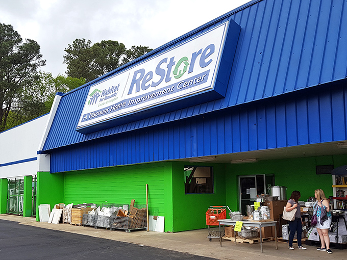 Habitat ReStore's vibrant blue-and-green exterior screams "eco-friendly finds inside!" Saving homes and wallets simultaneously since day one.