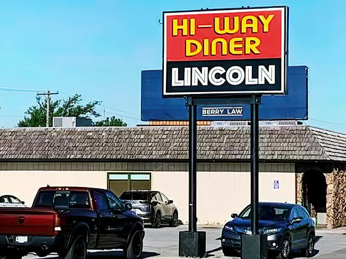 Hi-Way Diner's iconic sign stands tall against the Nebraska sky, beckoning hungry travelers like a breakfast lighthouse.