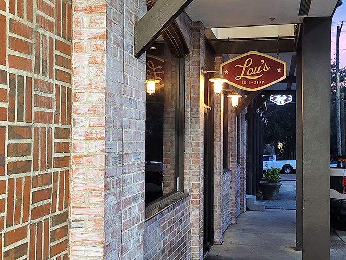 Lou's Full-Serv's brick exterior might be playing it cool, but inside those doors, sandwich magic is happening with Broadway-worthy flair.