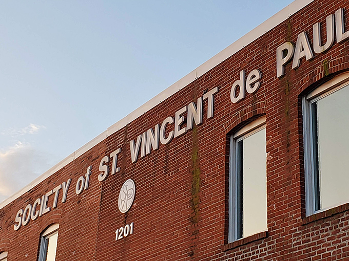 Mission 27's brick facade hides a wonderland of secondhand treasures. The thrill of the hunt begins at this unassuming entrance!