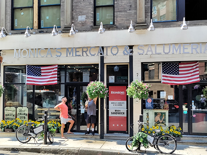 Monica's Mercato's vibrant storefront brings a slice of Italian sunshine to the North End, complete with American flags that say "We're Italian, but we're Boston Italian."