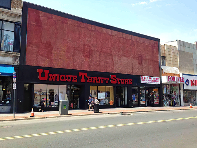 Unique by name, unique by nature! This Elizabeth storefront's bold red facade is like a siren call to thrift enthusiasts with empty trunks and full imaginations.