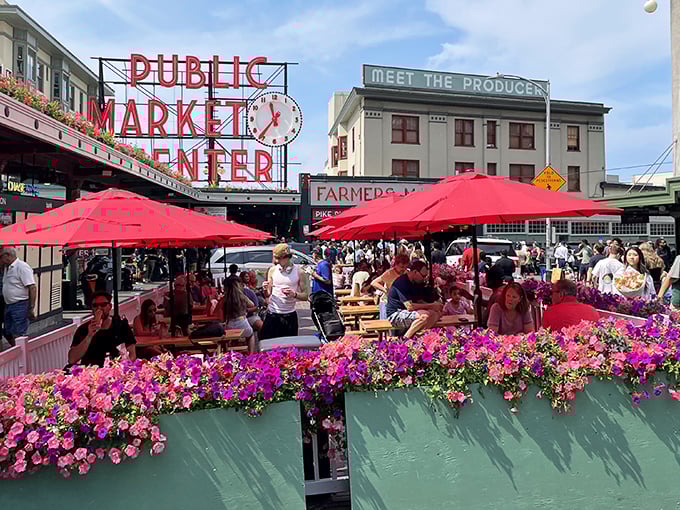 Pike Place Market in full bloom – where flying fish and flower stalls create Seattle's most colorful seafood theater.