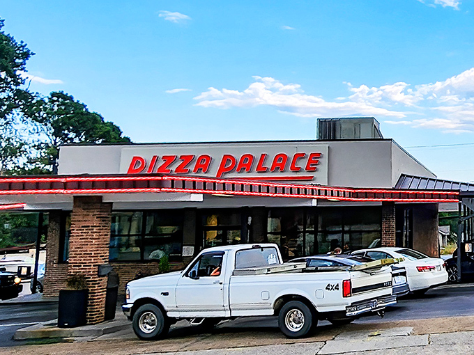 Pizza Palace's vintage storefront is like stepping into a time machine where the pizza recipe hasn't changed &ndash; and thank goodness for that!