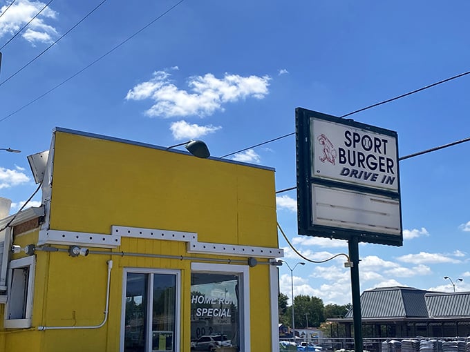 Sport Burger's sunny yellow exterior is like a cheerful hello before the main event. This unassuming box holds burger magic that locals treasure.