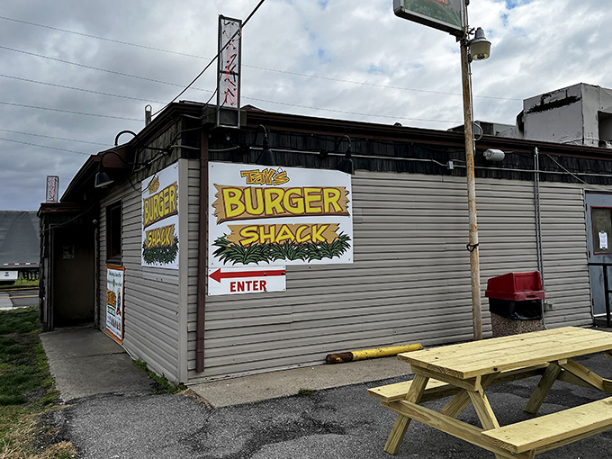 Tay's Burger Shack keeps it real with a no-frills exterior that belies the flavor explosion happening behind those simple walls.