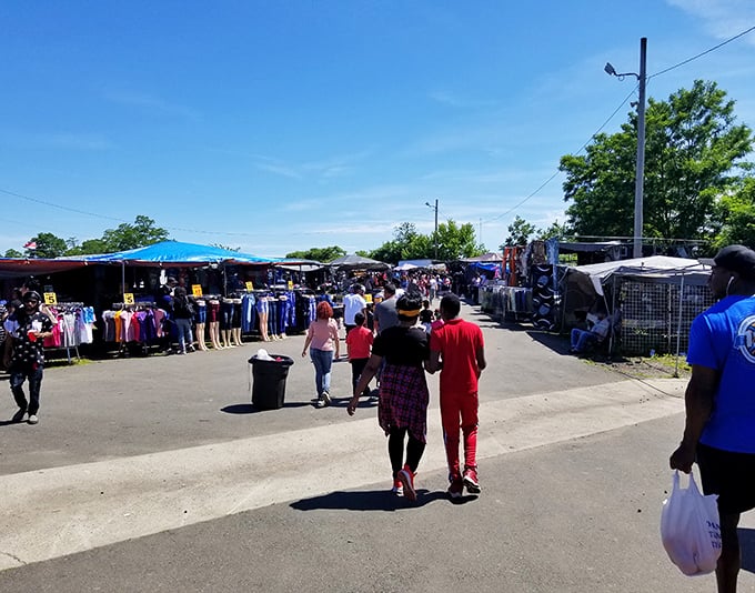 The Boulevard's colorful marketplace hums with energy as shoppers stroll between vendors, where haggling is both an art and entertainment.