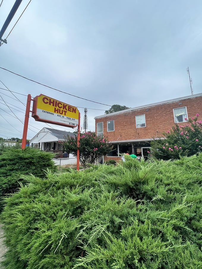 The Chicken Hut's sign promises exactly what you'll find inside &ndash; chicken nirvana. This Durham institution knows crispy perfection needs no fancy introduction.