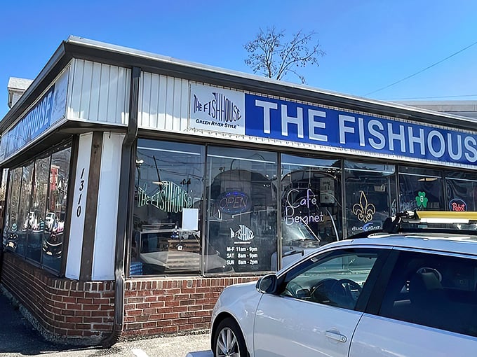The Fishhouse announces itself with no-nonsense blue lettering - like a friendly shout that fantastic fried fish awaits inside!