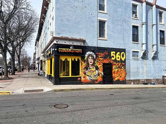 Melted Madness brings street art energy to the grilled cheese game. That mural isn't lying&mdash;things get deliciously fiery inside.