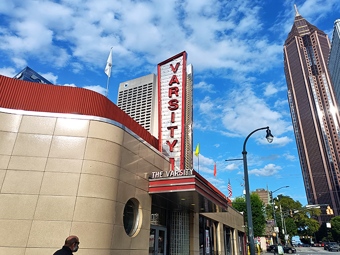 The iconic Varsity sign stands tall against Atlanta's skyline, a retro beacon that's been calling "What'll ya have?" since your grandparents' first date.