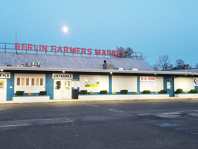 As dusk falls, Berlin Farmers Market's neon sign glows with promise &ndash; "Enter here for deals your wallet will thank you for."