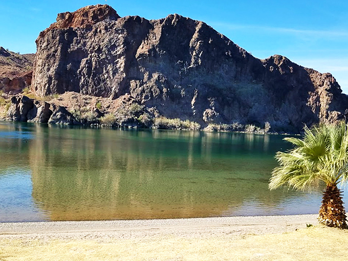 That perfect camping spot where the Colorado River whispers lullabies while mountains stand guard over your dreams.