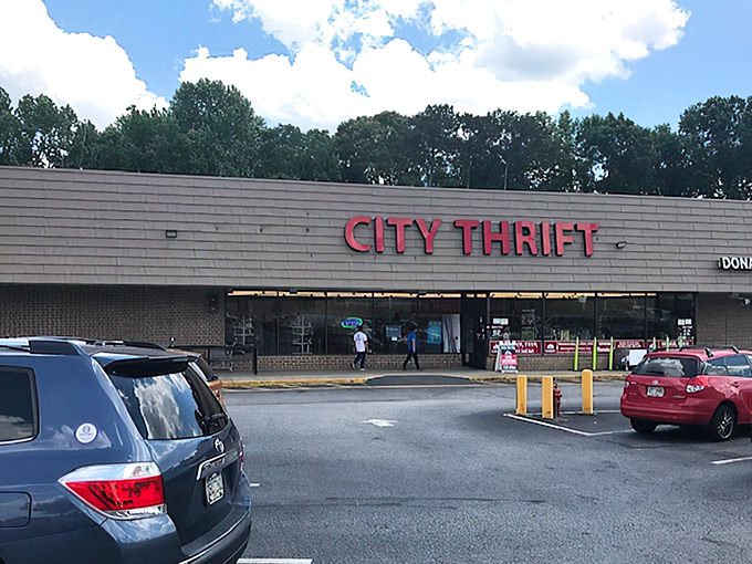 Halloween headquarters sign promises costumes galore. Why buy new when someone else's one-night wonder can become your spooky masterpiece?