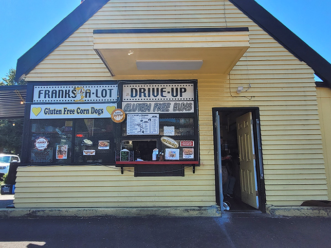 The sign promises "Vegan Dogs" and "Gluten Free Buns" - proof that dietary restrictions and deliciousness can peacefully coexist.