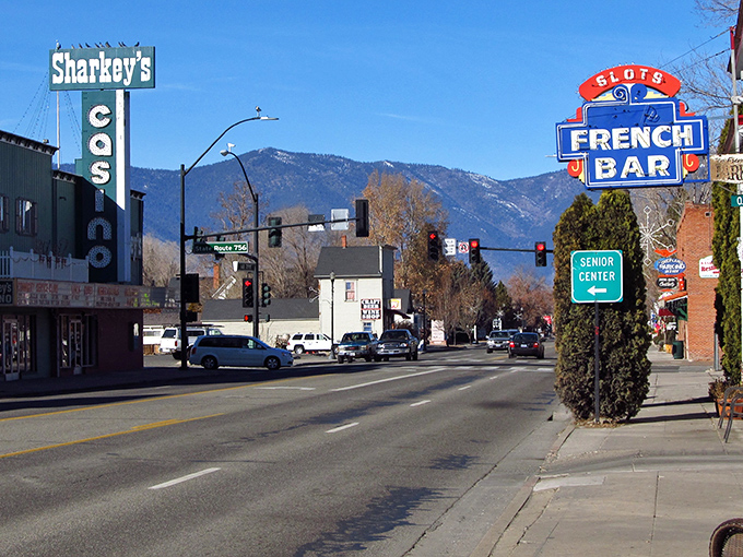 The French Bar's vintage sign promises small-town charm in Gardnerville, where "rush hour" means three cars waiting patiently at the stoplight.