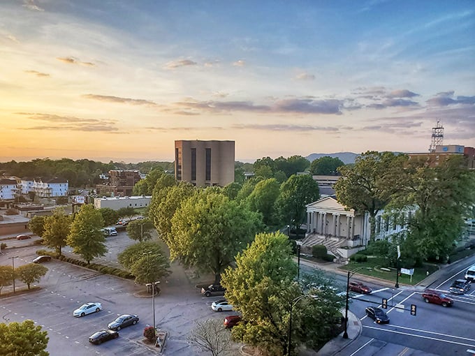 The golden hour bathes downtown Greenville in warm light, transforming brick buildings into a scene worthy of a retirement brochure cover.