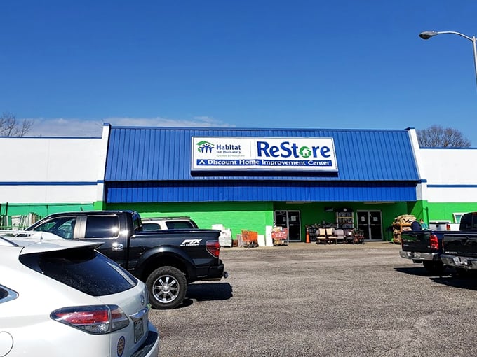 DIY paradise awaits! Habitat ReStore's cheerful façade hints at the home improvement treasures lurking within its cavernous interior.