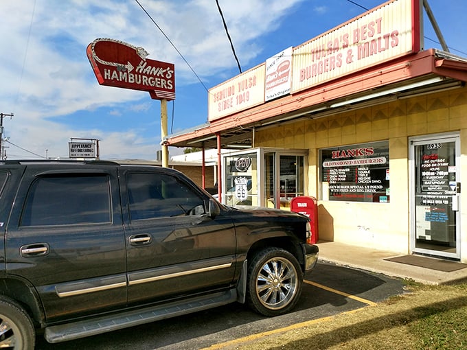 This unassuming yellow building houses Tulsa's answer to burger paradise. The "Serving Since 1949" sign isn't just decoration&mdash;it's a promise.