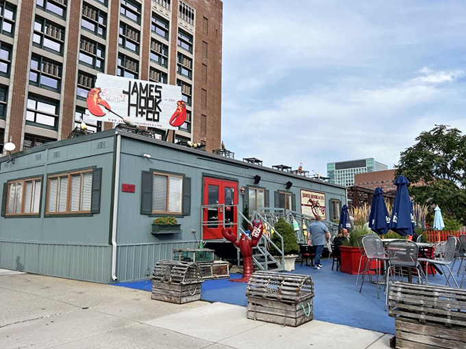 Boston's seafood gem glows at sunset, transforming from humble shack to cathedral of crustaceans by evening.